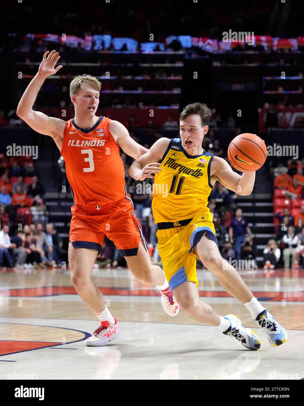 Marquette guard Tyler Kolek (11) drives to the basket as Illinois ...