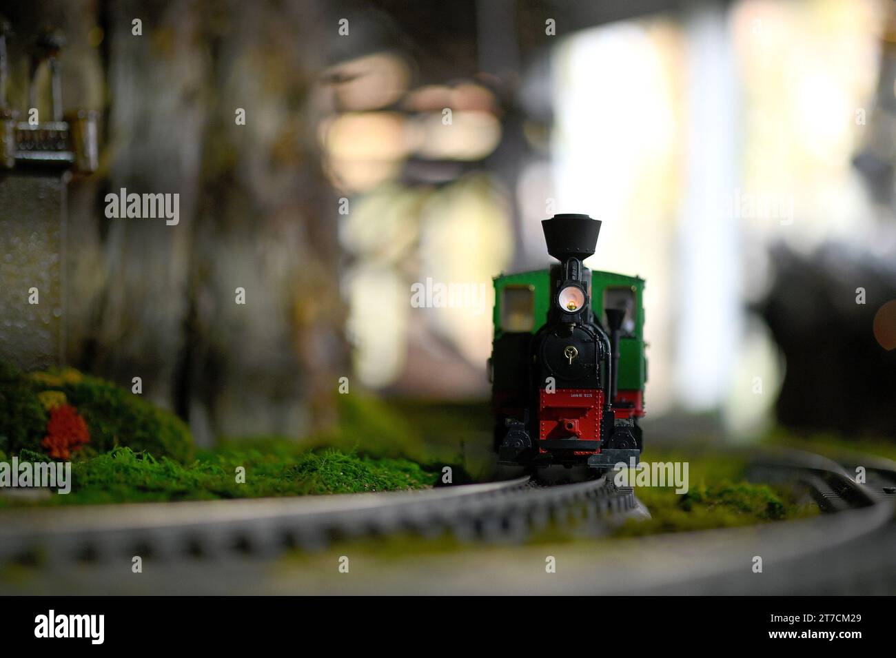 New York, USA. 14th Nov, 2023. Model electric trains run through ...