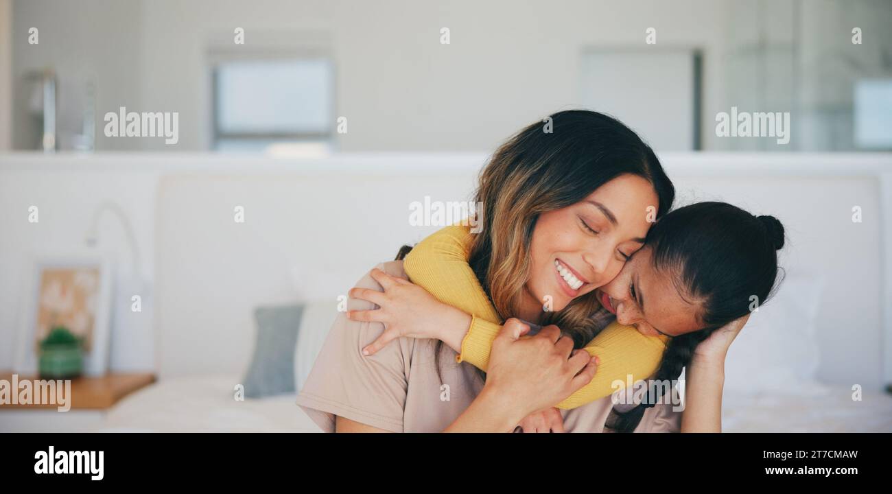 Love, hug and a mother hugging her daughter in the bedroom of their ...