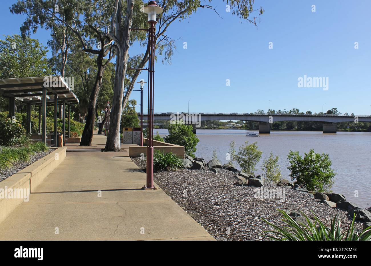 View of the Rockhampton waterfront with the Fitzroy River and bridge in ...