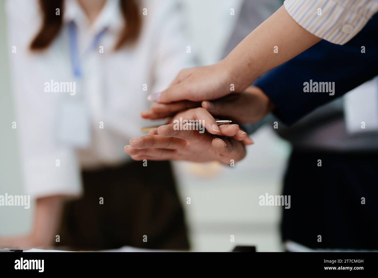 business group people showing unity with their hands together Stock ...