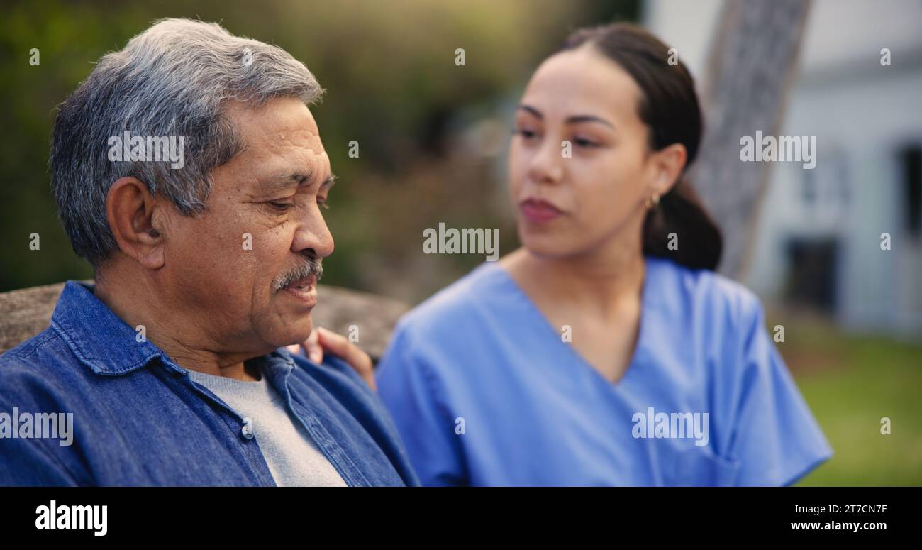 Medical doctor sitting on bench hi-res stock photography and images - Alamy