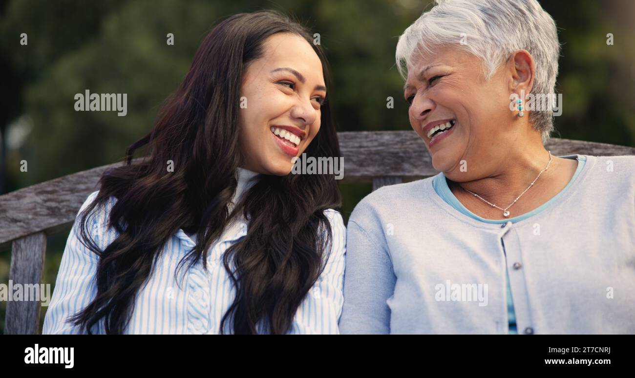 Happy, mature and mother with woman on bench, nature and bonding for ...