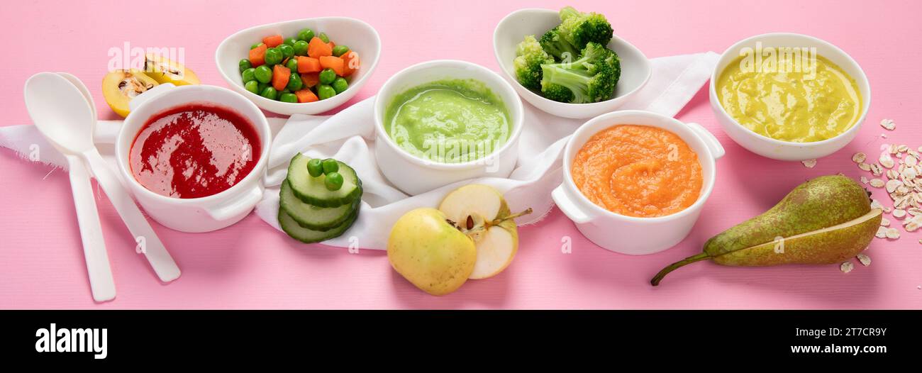 Vegetable and fruit baby puree in white bowls with ingredients on a ...