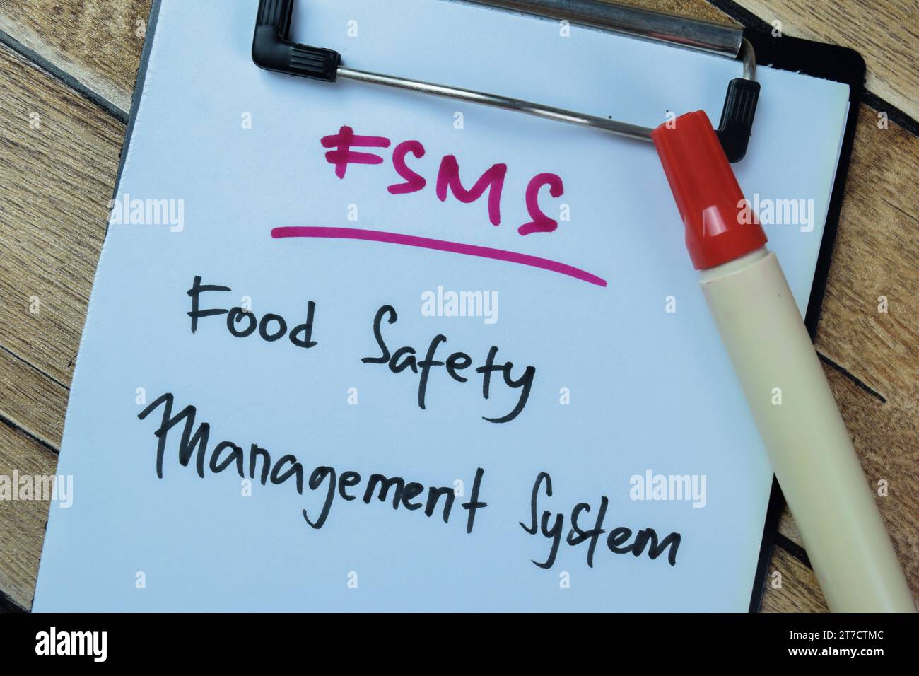Concept of FSMS - Food Safety Management System write on paperwork ...