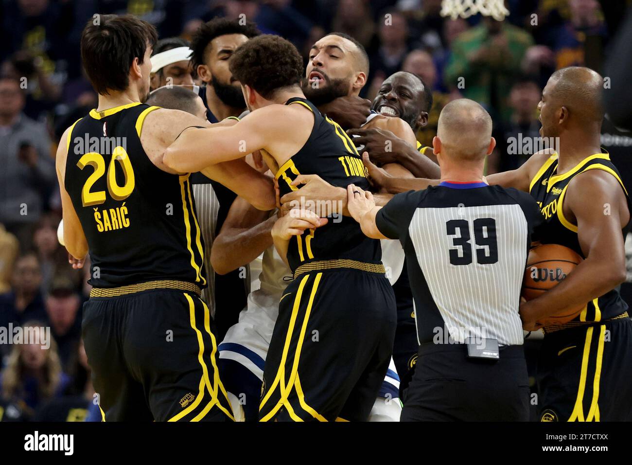 Golden State Warriors' Klay Thompson, front, and Draymond Green, back, get into an altercation ...