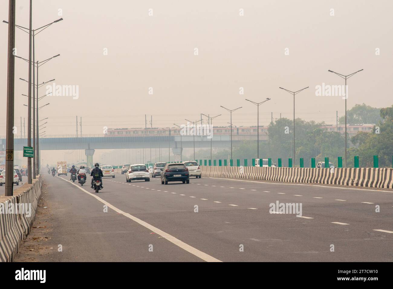 New Delhi, India. 14th Nov, 2023. Delhi Metro rail seen on a smoggy day ...