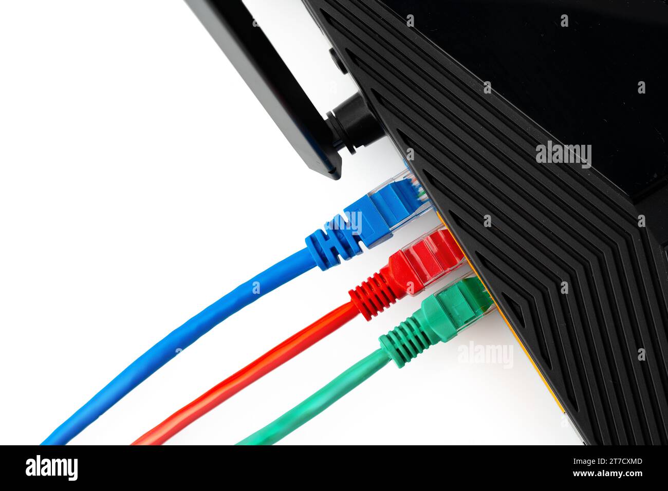 Modern router with cables plugged in close up Stock Photo - Alamy