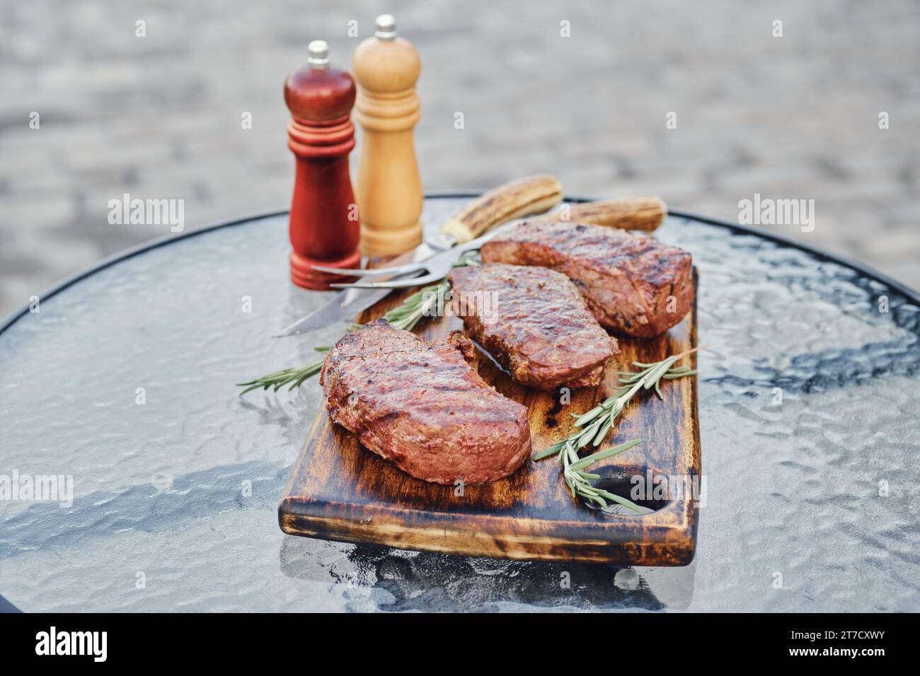 Cutting striploin steak knife hi-res stock photography and images - Alamy