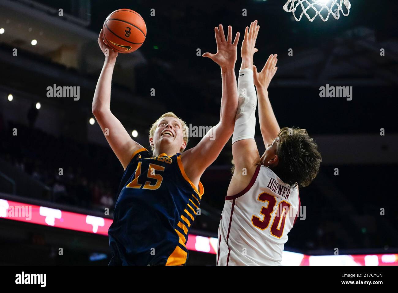 UC Irvine center Bent Leuchten, left, shoots against Southern ...