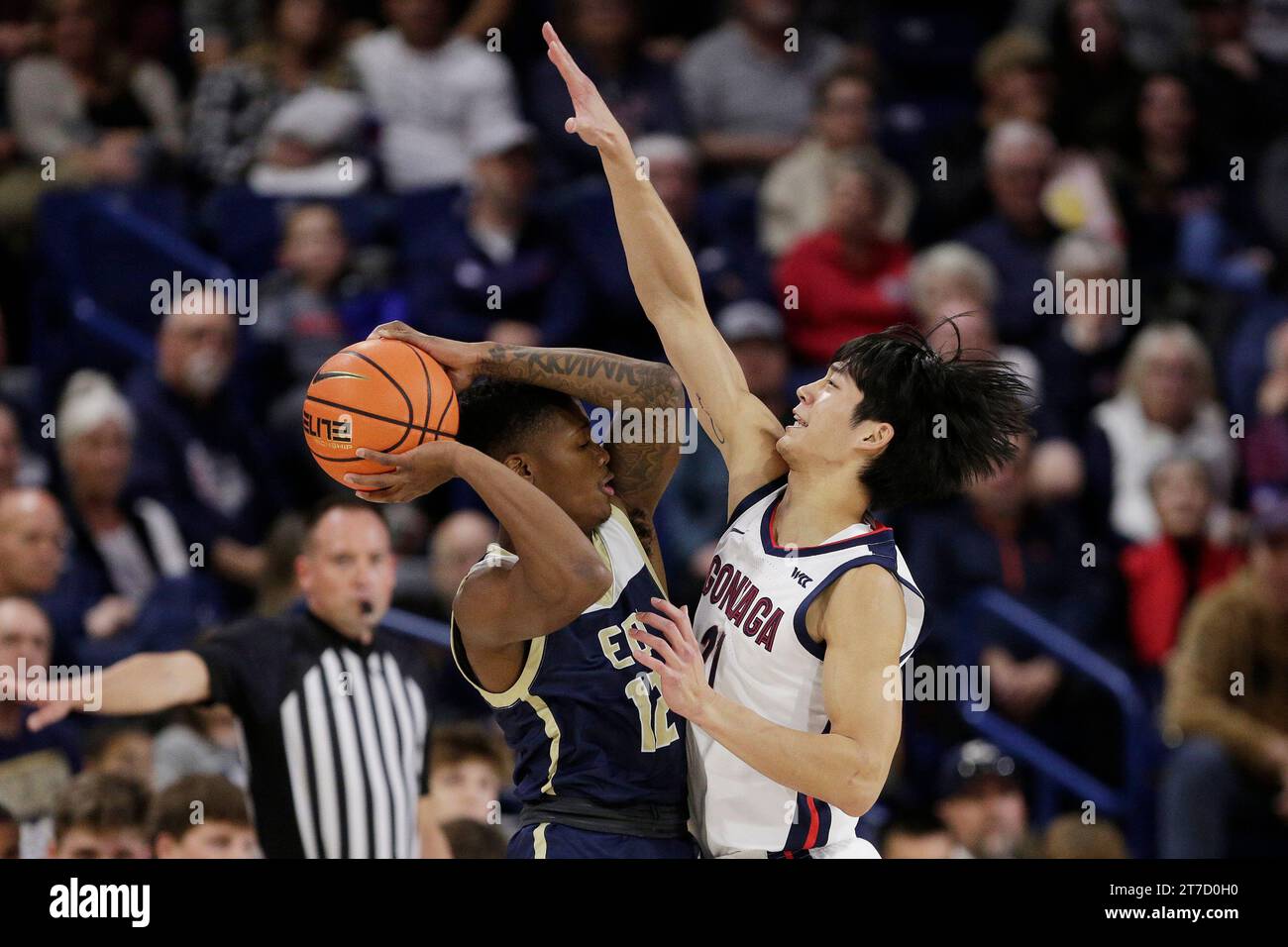 Eastern Oregon guard Vanti Erving (12) controls the ball while ...