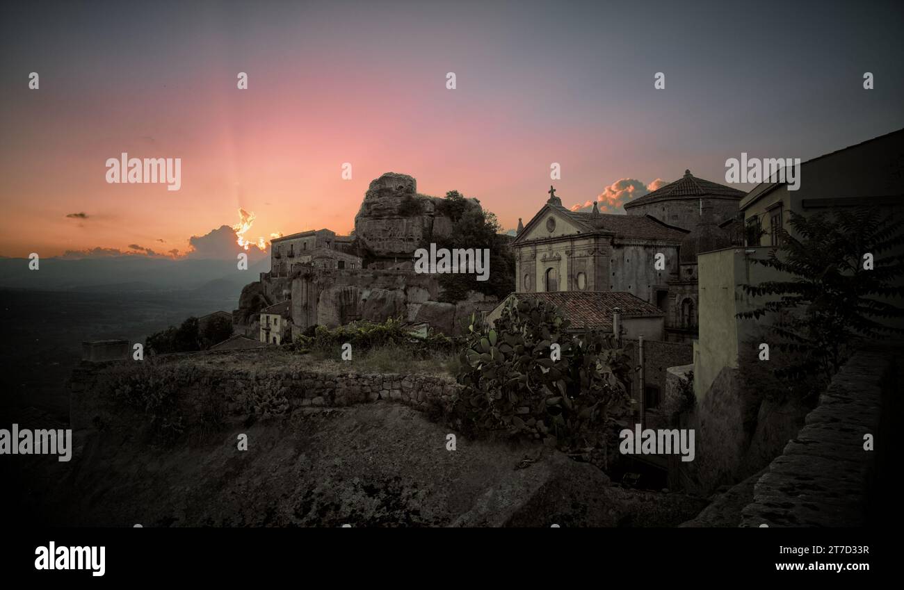 panoramic landscape at the sunset of Castle of Lauria and Basilica of ...