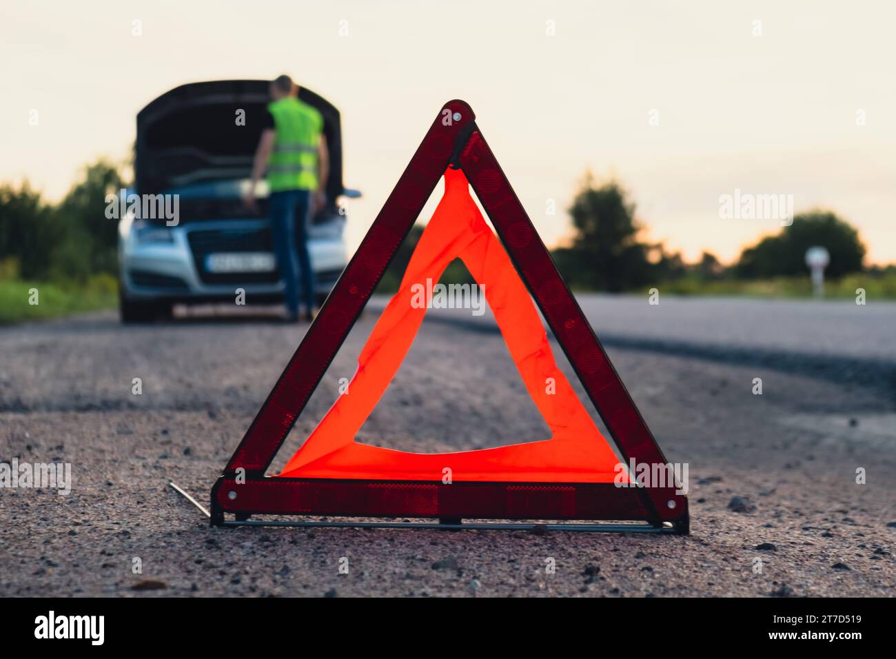 Car standing near stop sign hi-res stock photography and images - Alamy