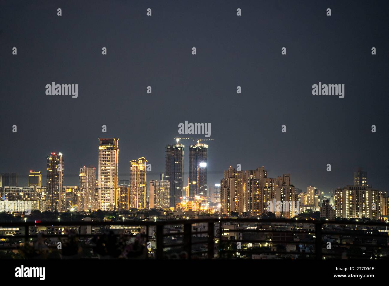 Wide angle shot showing skyscrapers multi story building at dusk with ...