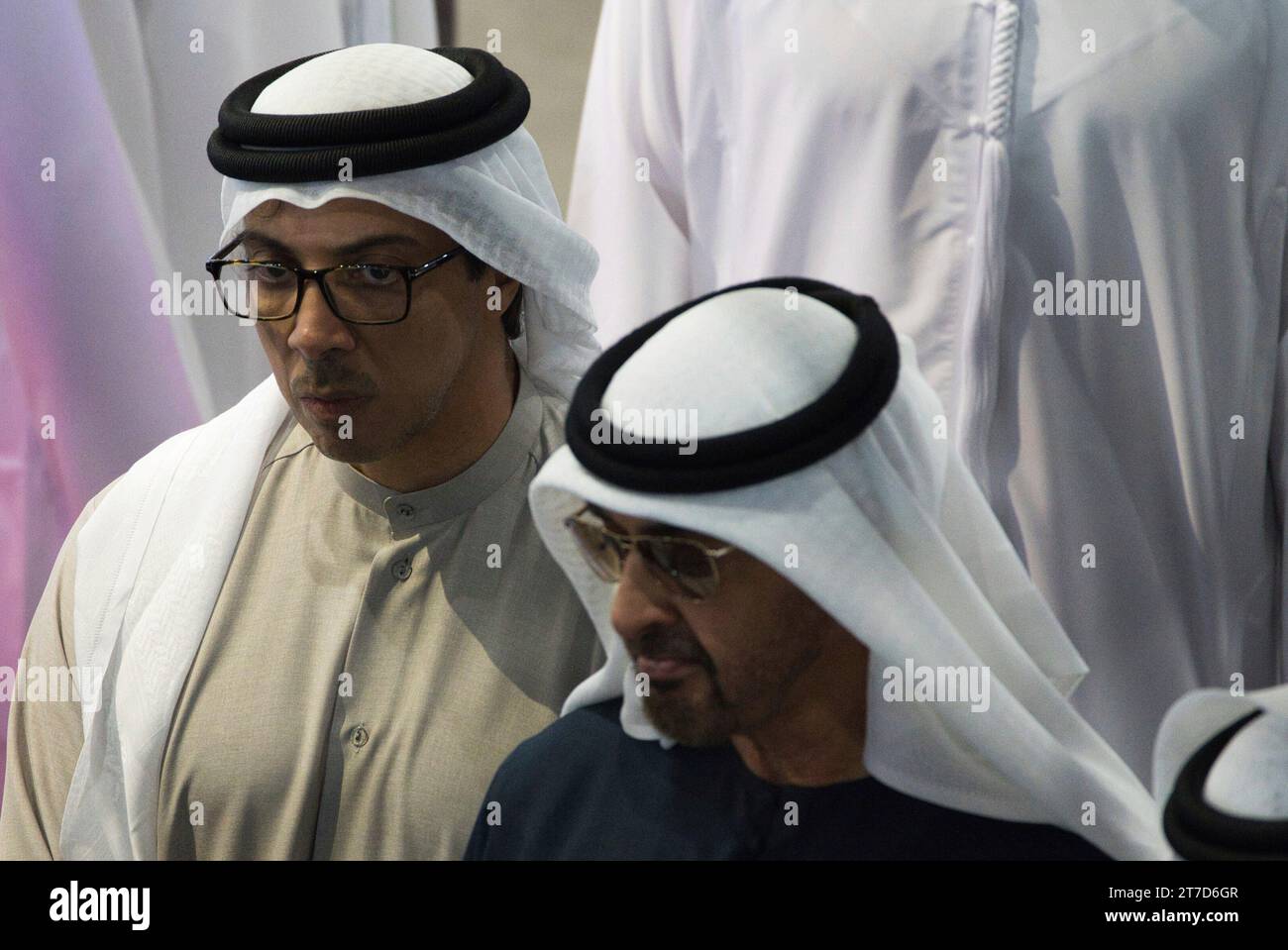 Sheikh Mansour bin Zayed Al Nahyan, back, walks with Sheikh Mohammed ...