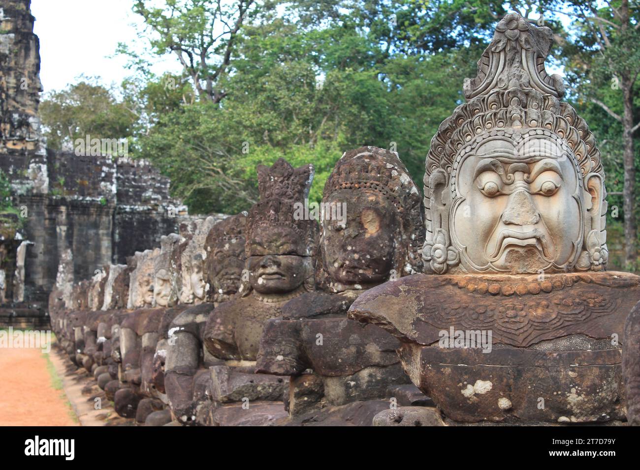 Asura (demon) statues line the road at one of the temples in the Angkor ...
