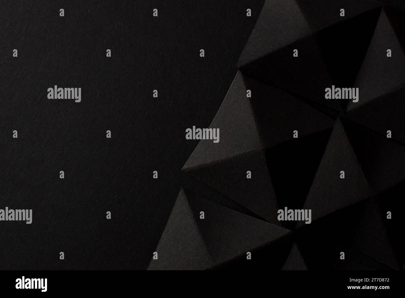 Abstract black diagonally divided background with geometric shapes ...