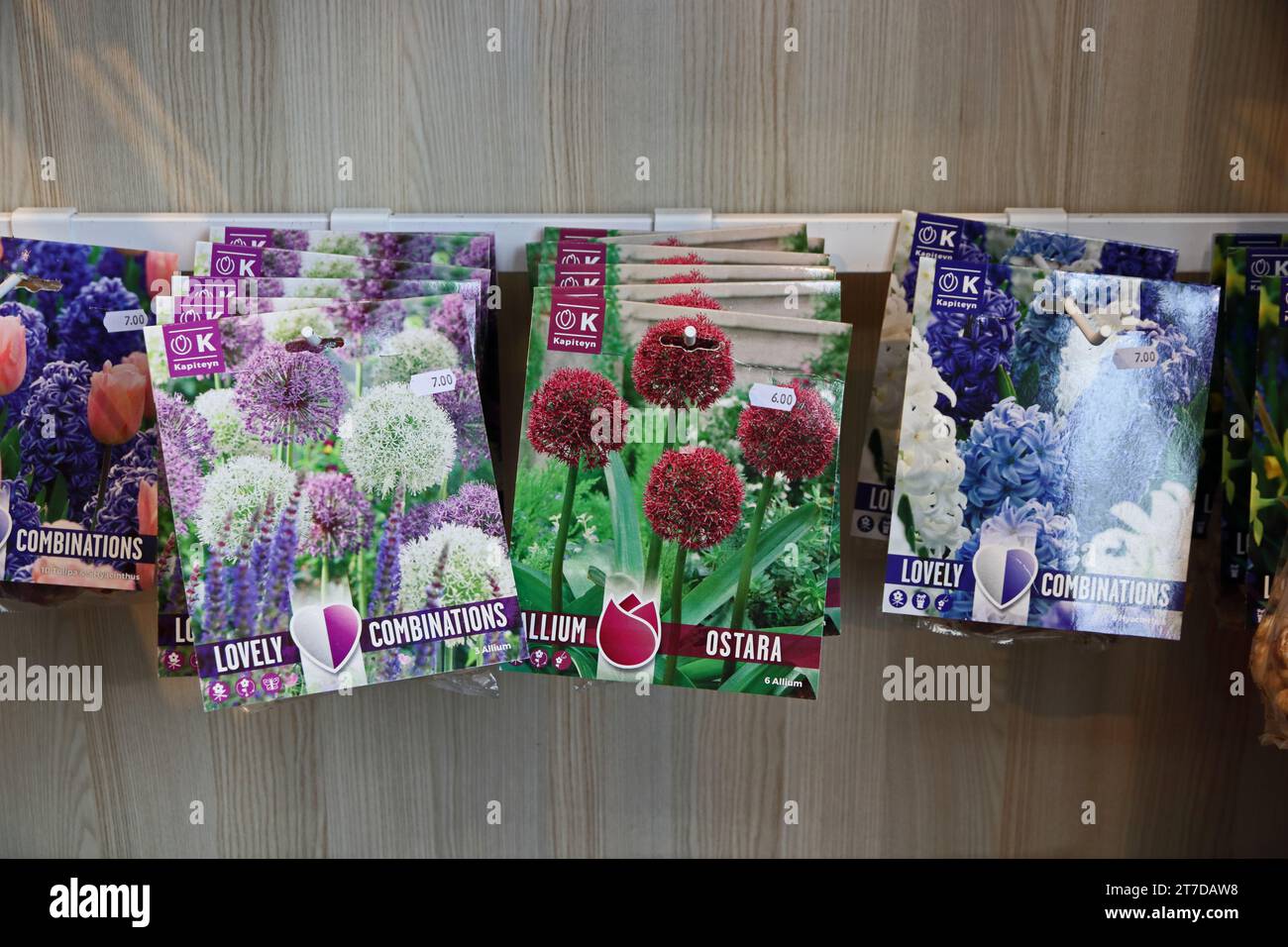 Packets of bulbs on display in garden centre Stock Photo - Alamy