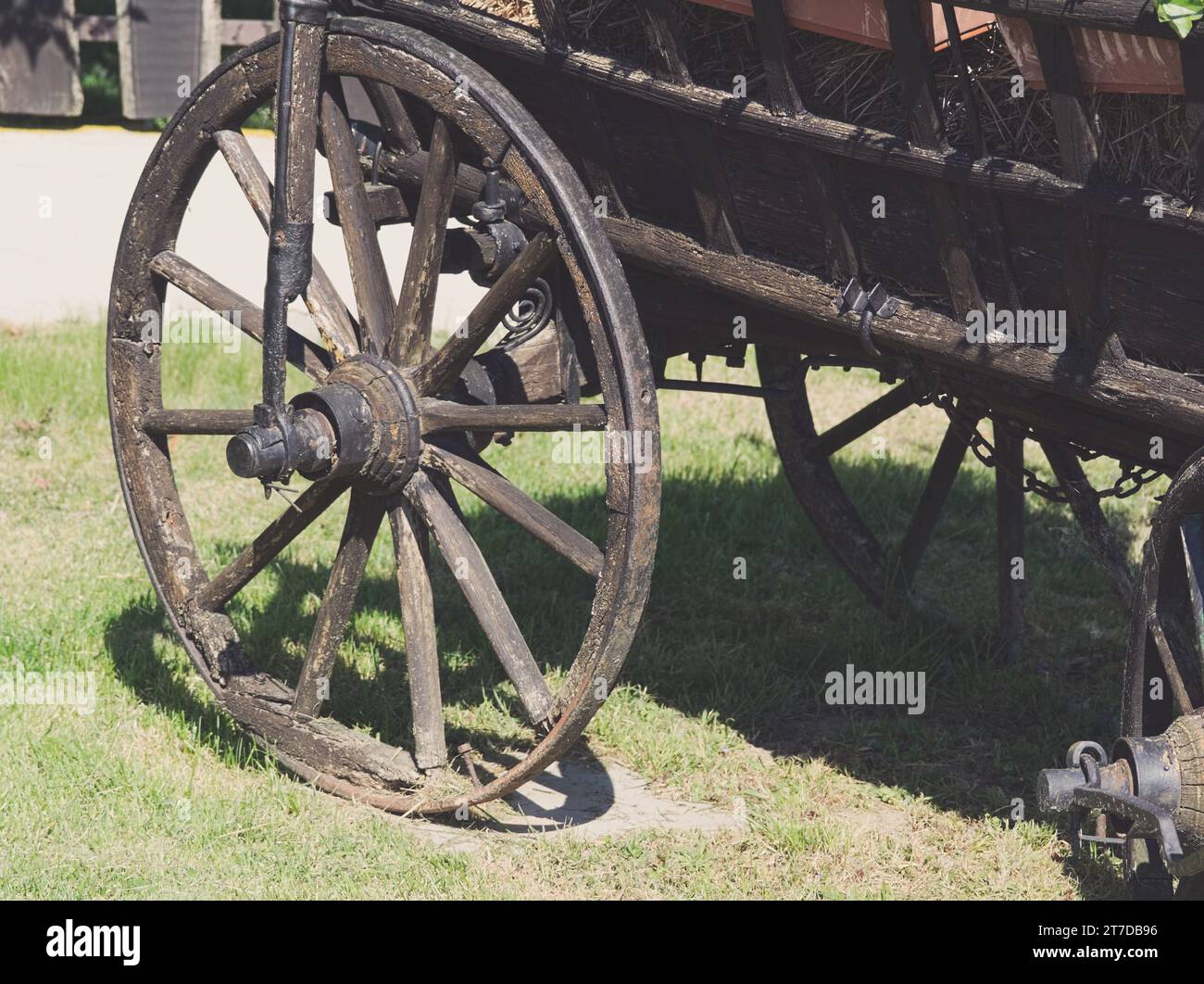 Sunny Day in the Countryside: Hay Cart Wheel Stock Photo - Alamy