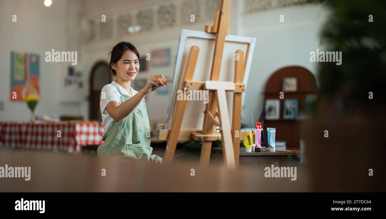 Talented Female Artist Working on a artist lifestyle. painting hobby ...