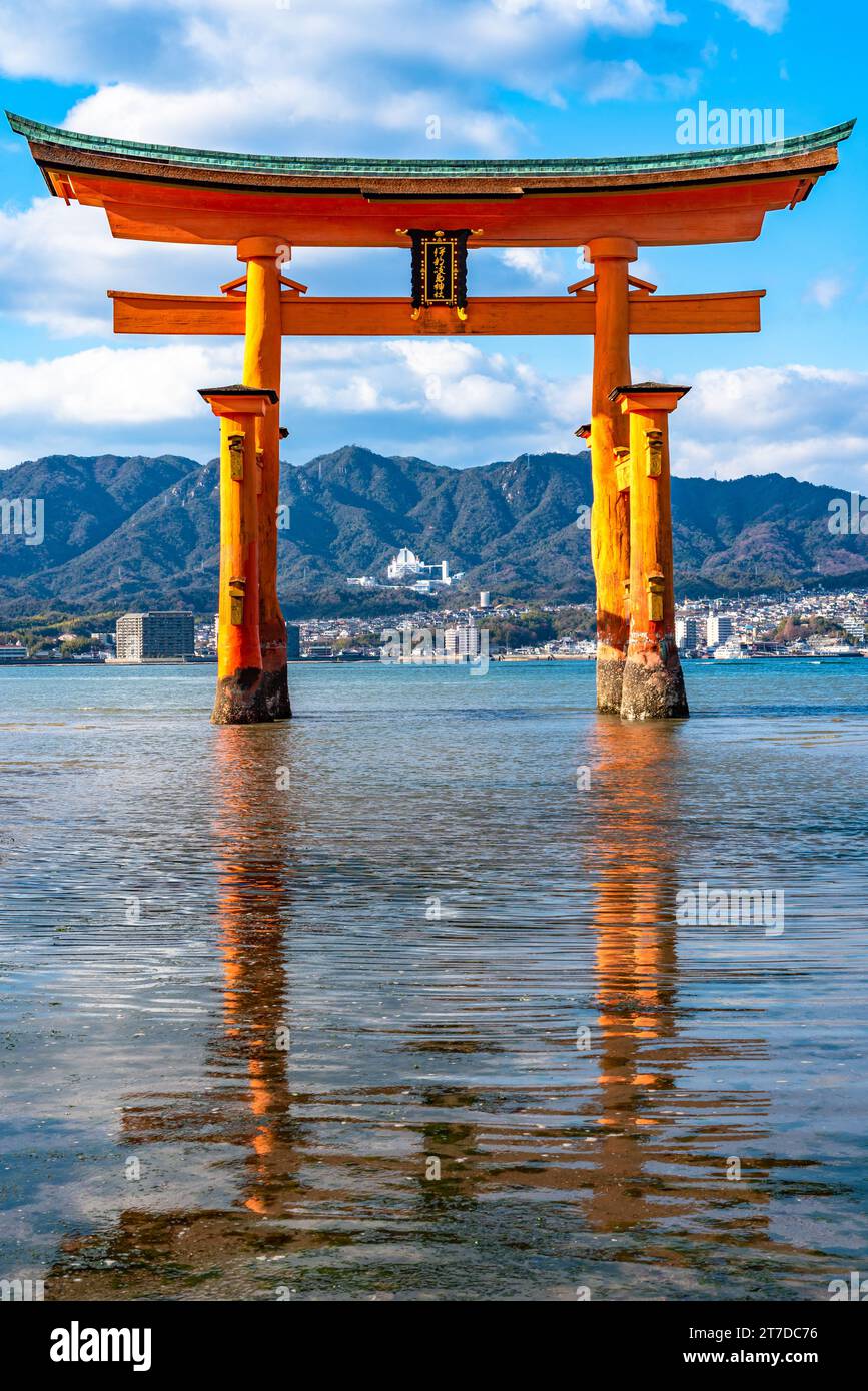 Floating orange red giant Grand O-Torii gate stands in Miyajima island ...