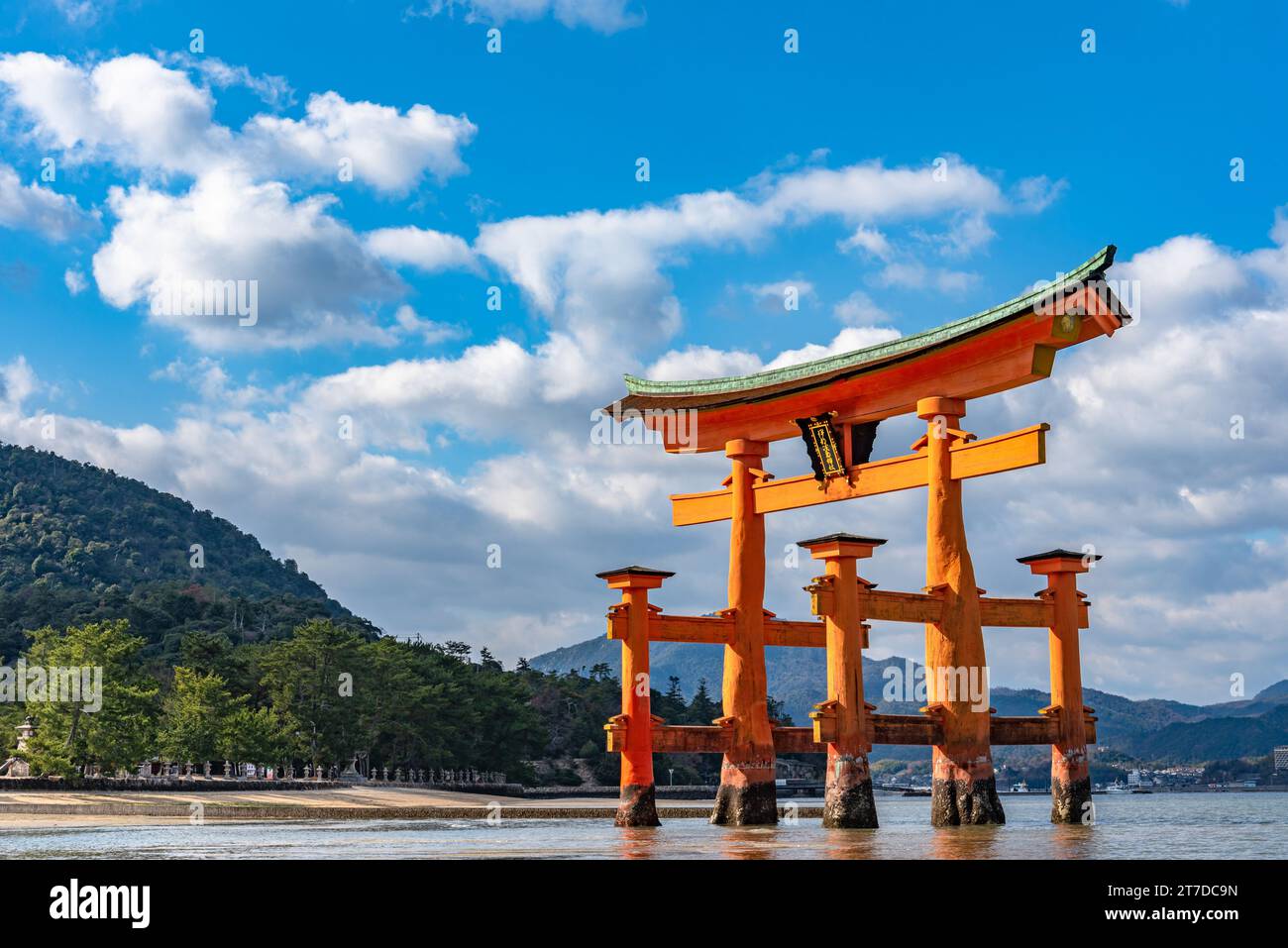 Floating orange red giant Grand O-Torii gate stands in Miyajima island ...