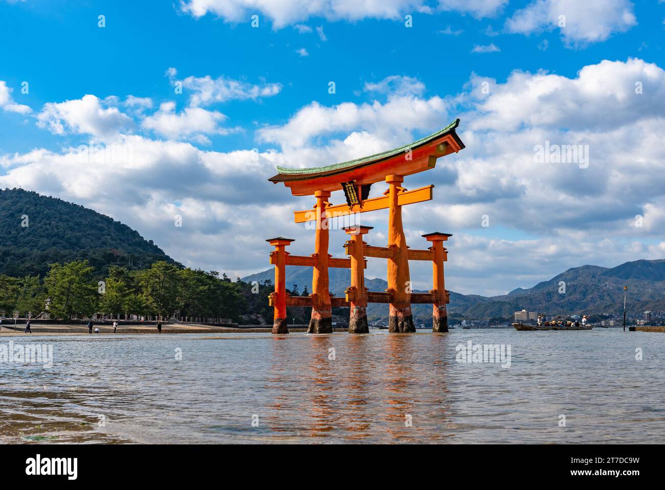 Floating orange red giant Grand O-Torii gate stands in Miyajima island ...