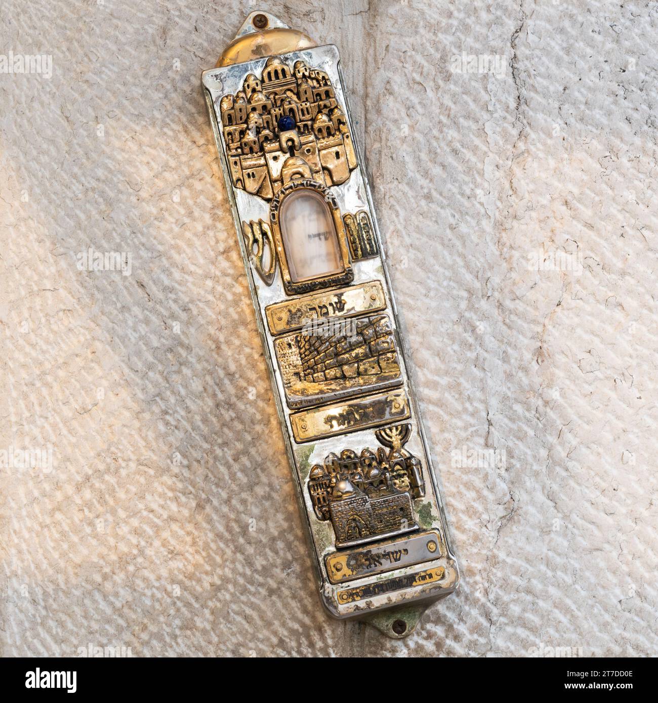Large mezzuzah containing a scroll with the text of the Shema Yisrael ...