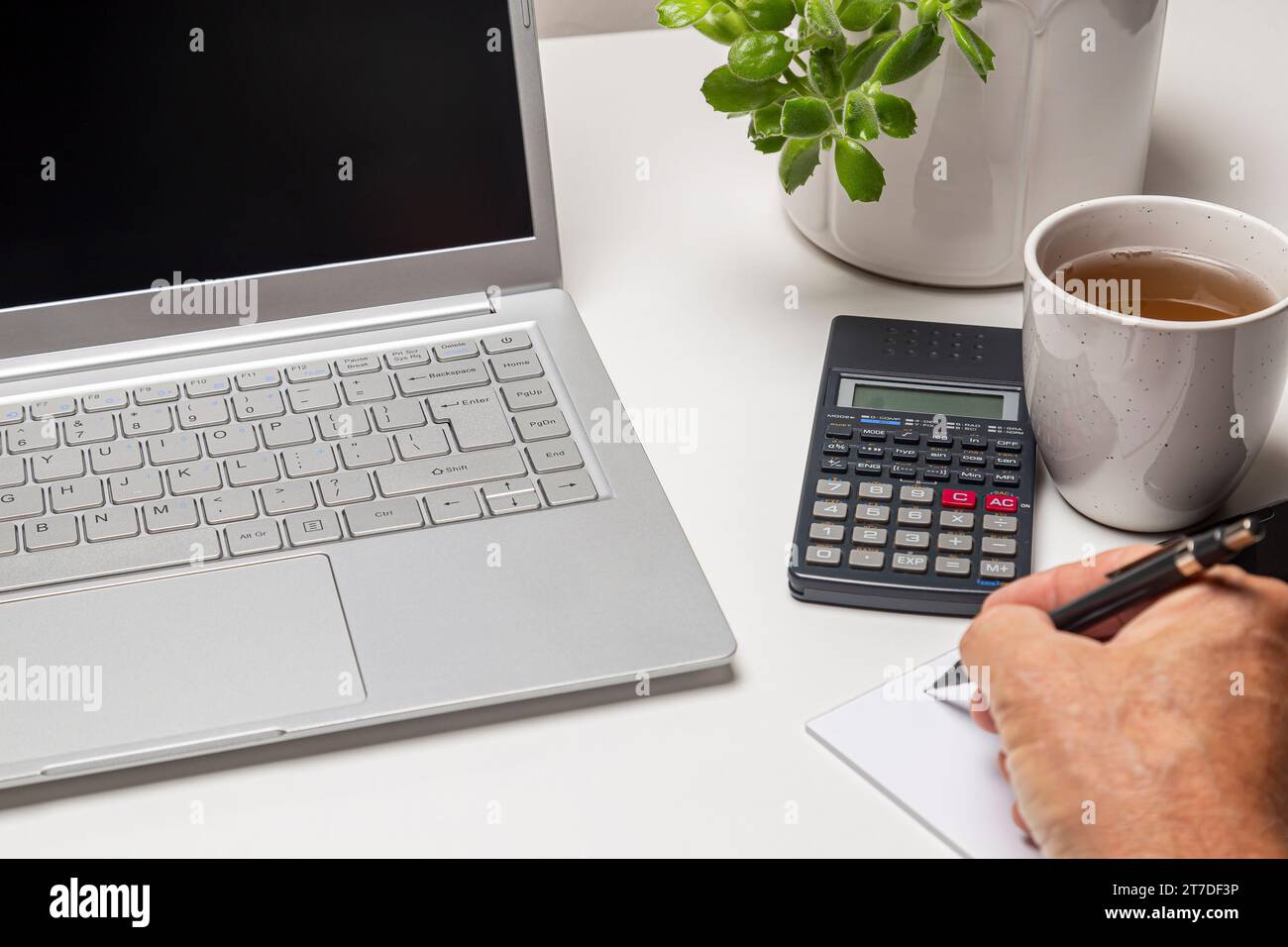 Calculating device hi-res stock photography and images - Alamy