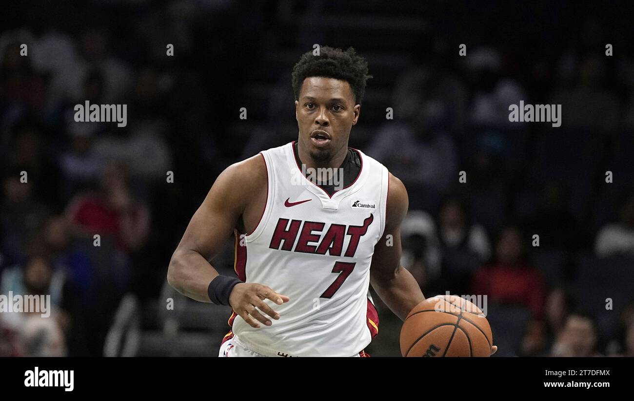 Miami Heat guard Kyle Lowry brings the ball down court against the ...