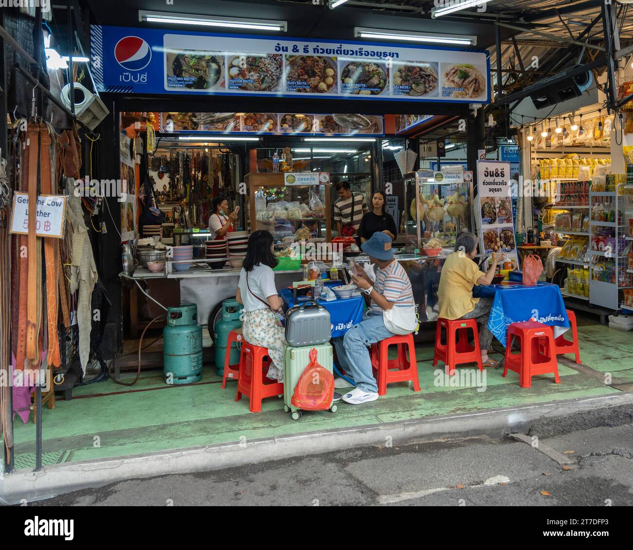 Bangkok, Thailand. 11th Nov, 2023. Tourists are seen eating street food ...