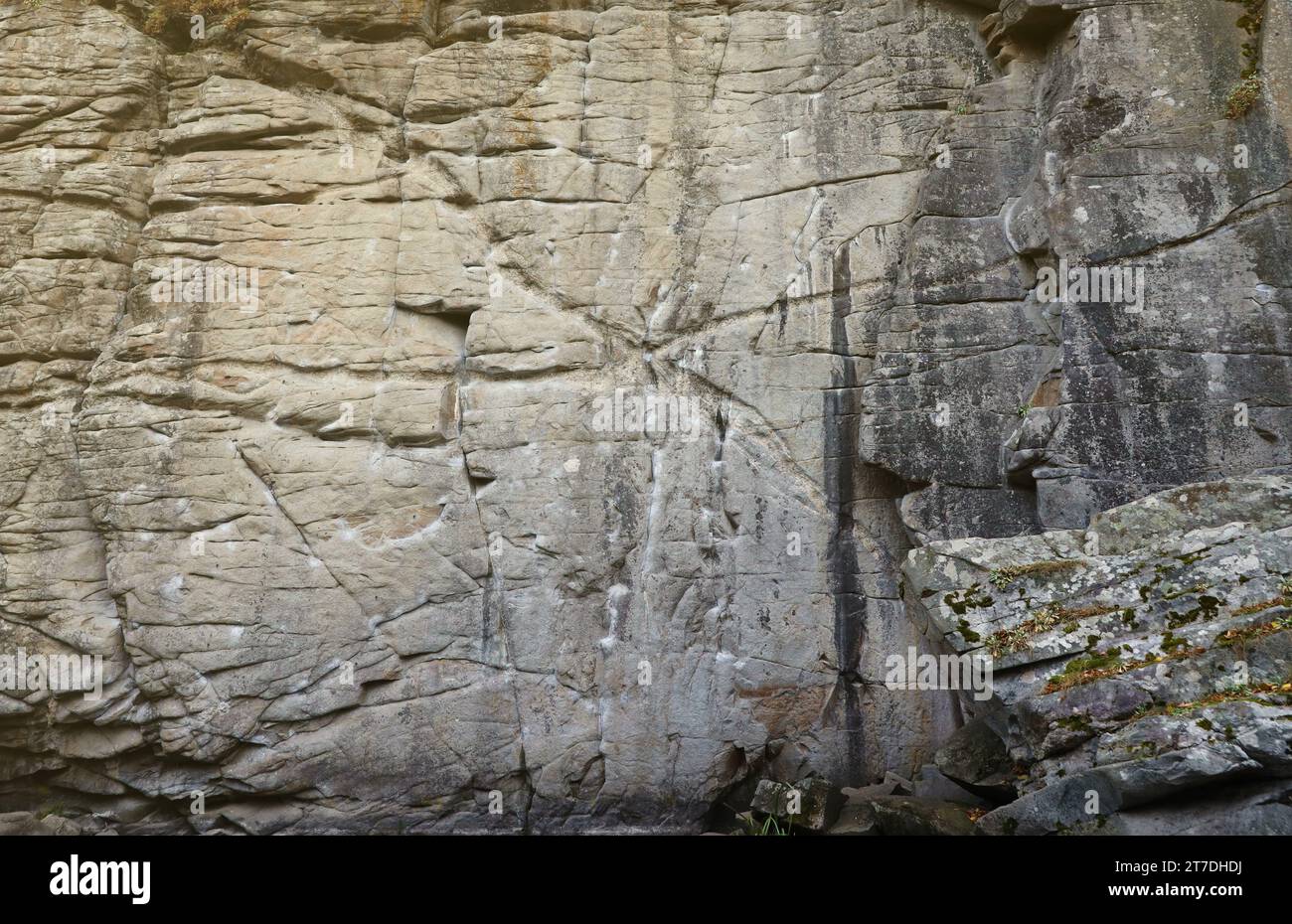 Light coarse natural rock stone background. Mining cliff rough front ...