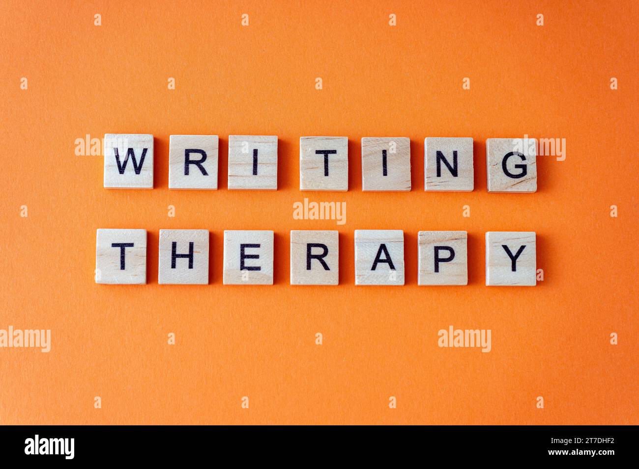 Word writing therapy. The phrase is laid out in wooden letters top view ...
