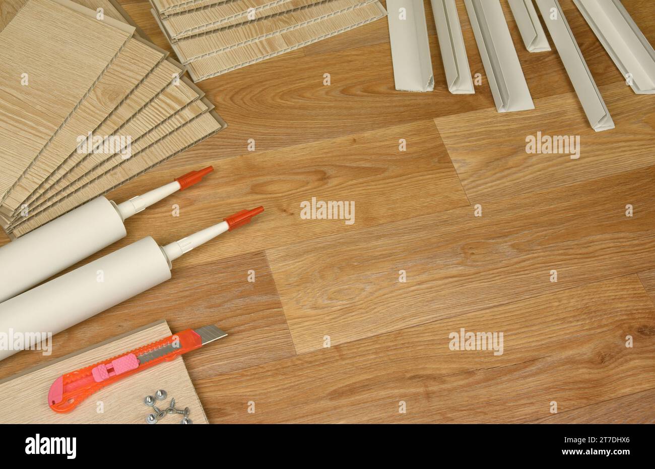 Set of items for PVC ceiling indoor works. Assembly adhesive bottles ...