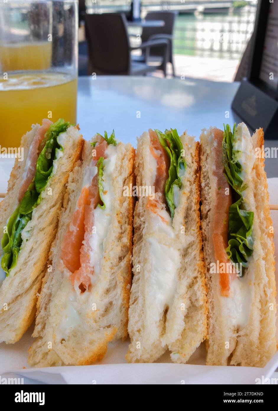 Toasted sandwich of Salmon mayo and salad, Iseo Italy.September 2023 ...
