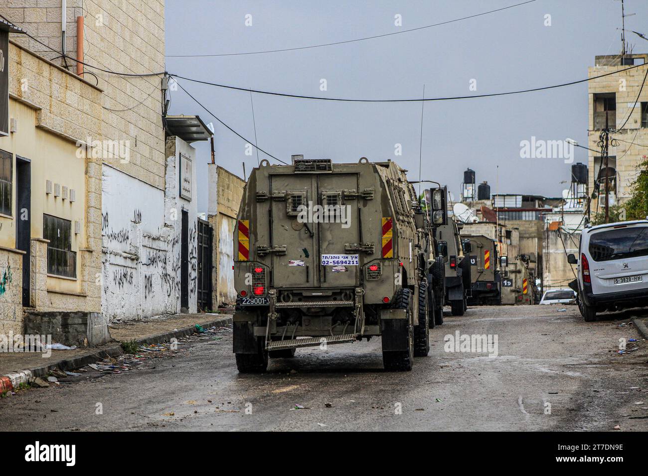 Tulkarm, Palestine. 14th Nov, 2023. Israeli military vehicles drive ...