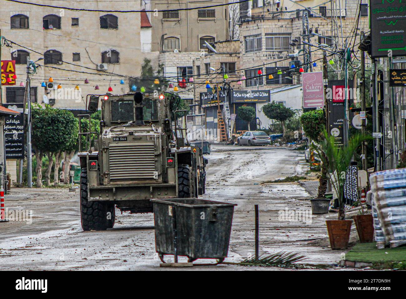 Tulkarm, Palestine. 14th Nov, 2023. Israeli military vehicles drive ...