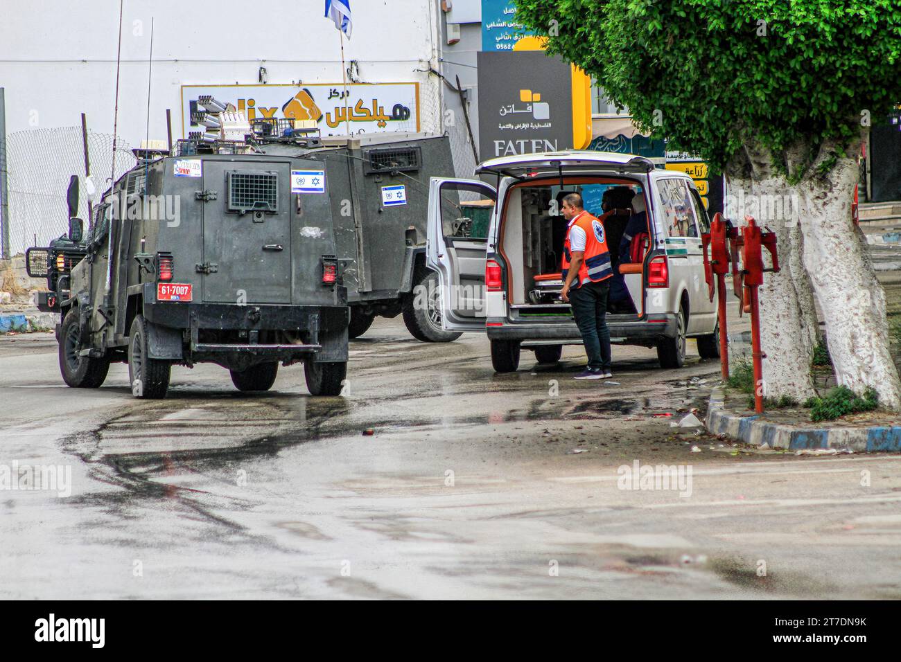 Tulkarm, Palestine. 14th Nov, 2023. Israeli military vehicles drive ...