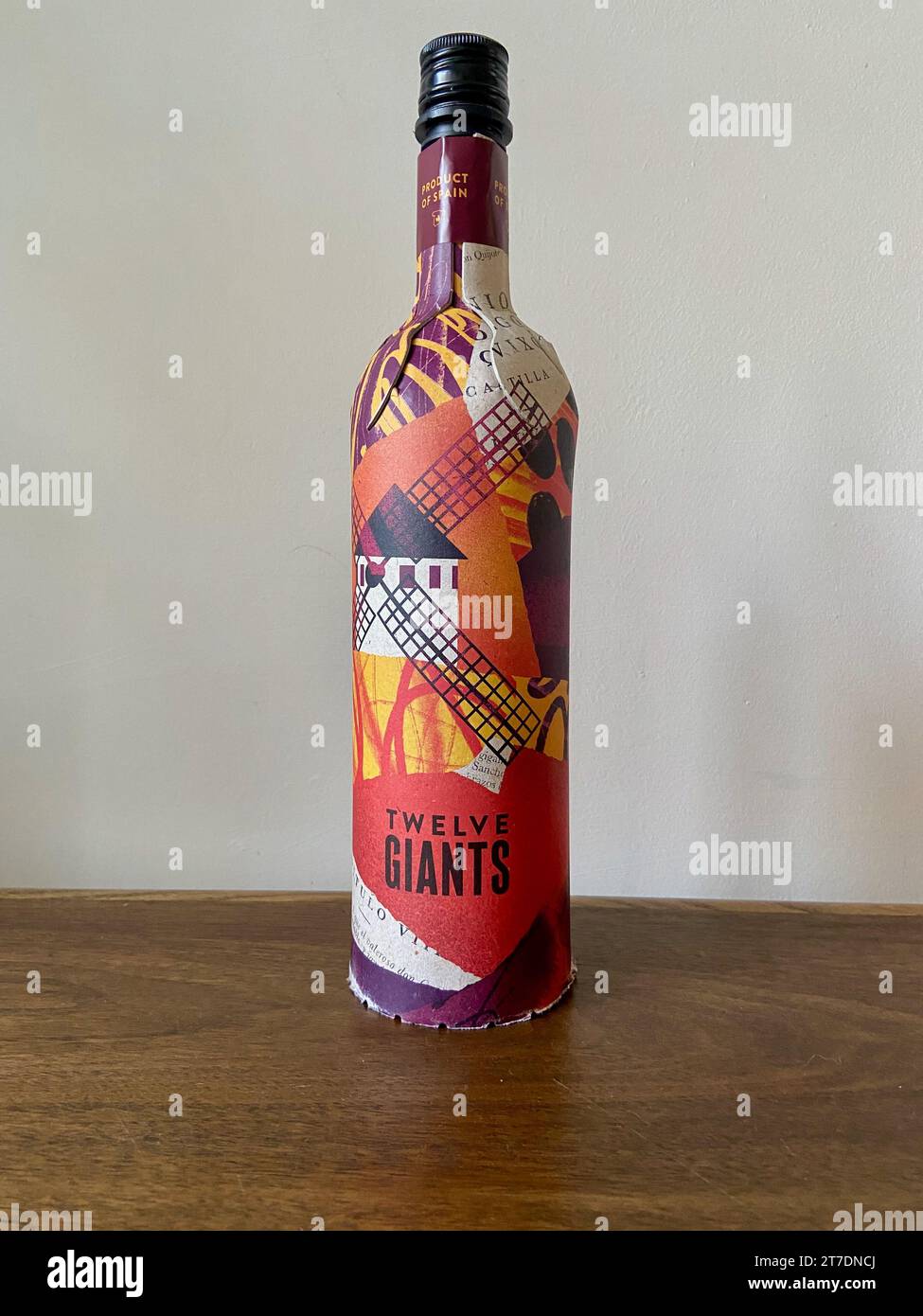 a bottle of spanish red merlot twelve giants produced in a recyclable ...