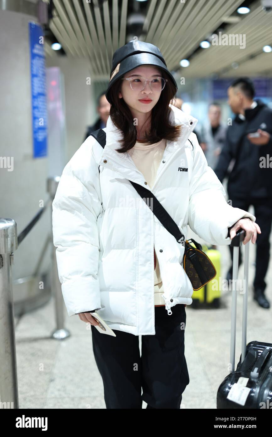 Chinese singer and actress Lin Siyi appears at the airport in Beijing ...