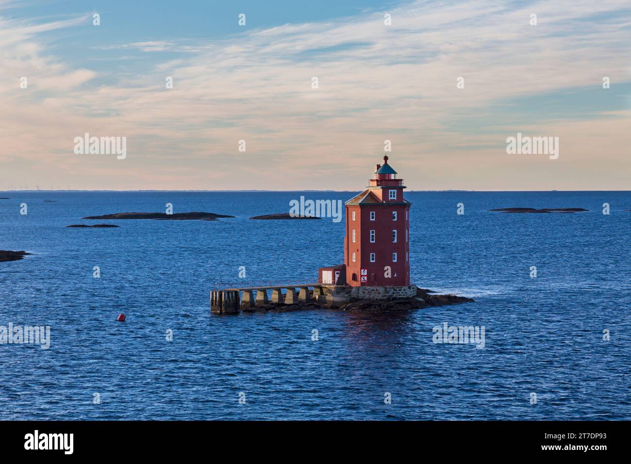 Kjeungskjaer Fyr lighthouse, red octagonal in shape, at Bjugnfjorden ...