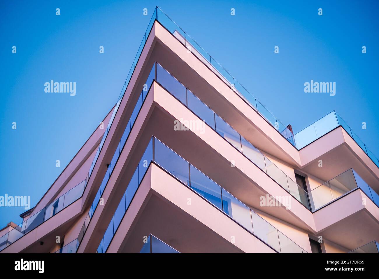 Modern geometric Building against blue Sky in Low Angle and perspective ...