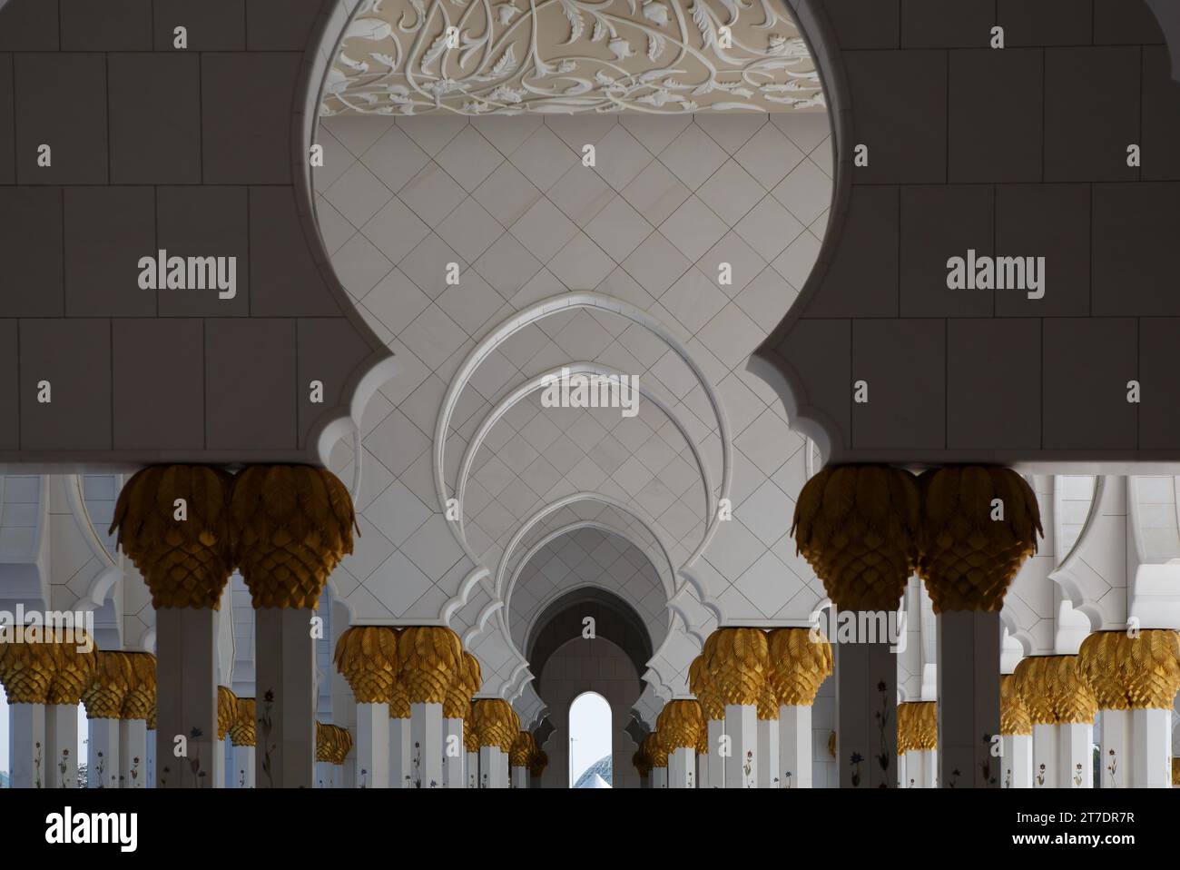 Arch and columns of the Sheikh Zayed Grand Mosque in the courtyard. Abu ...