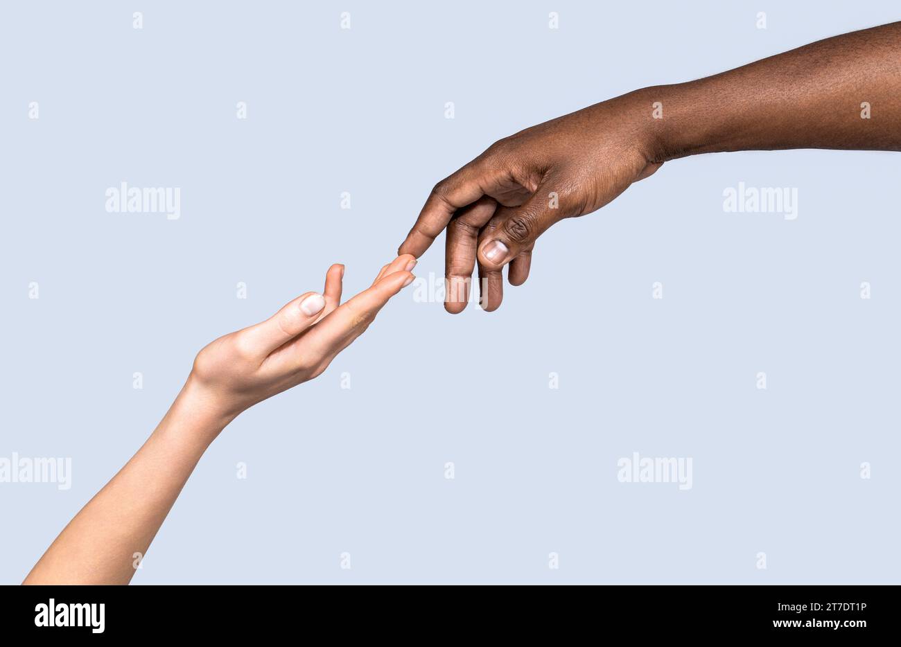 World unity and racial love and races. Hand skin colors touch two ...