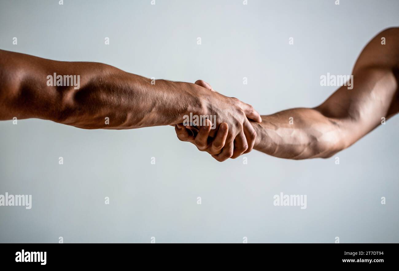 Friendly handshake, friends greeting, teamwork, friendship. Rescue ...