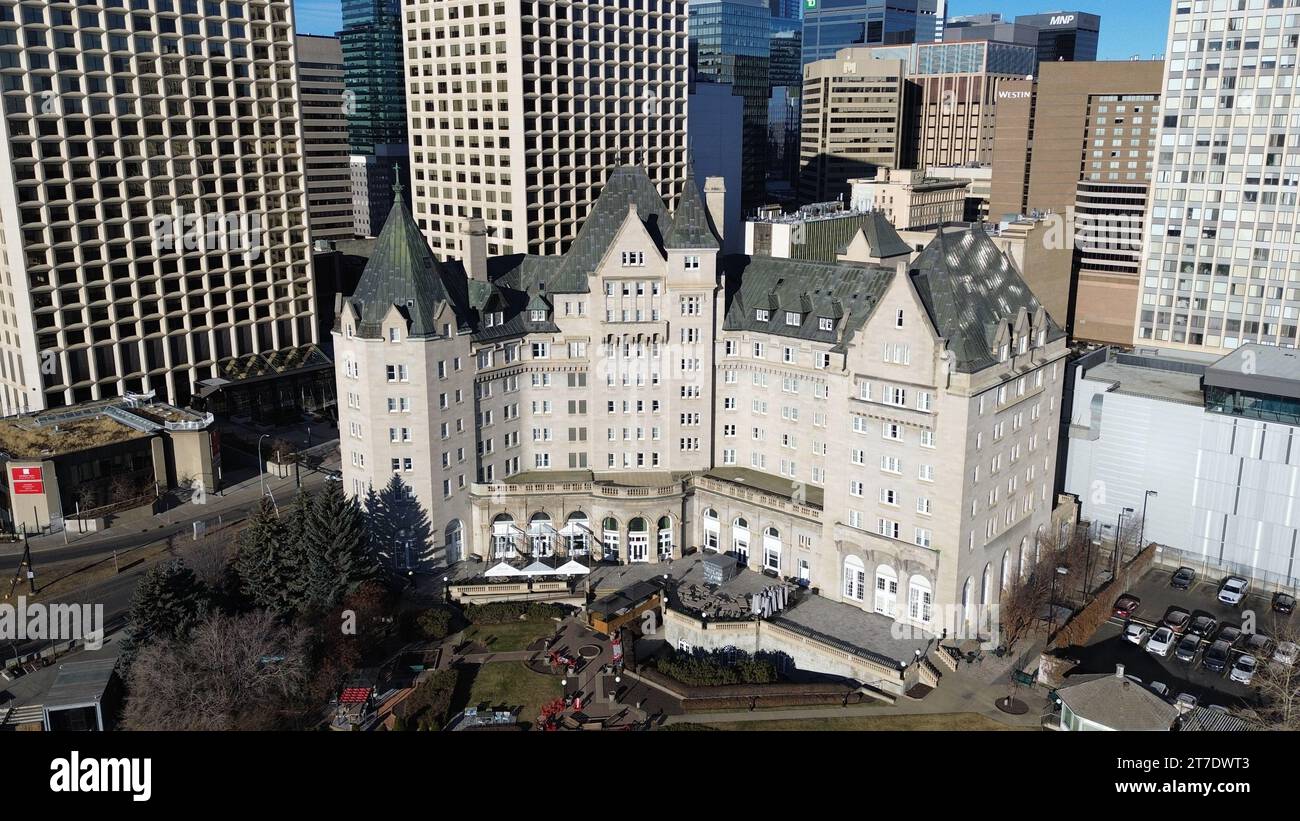 Aerial view of a historical castle-style hotel situated in a bustling ...
