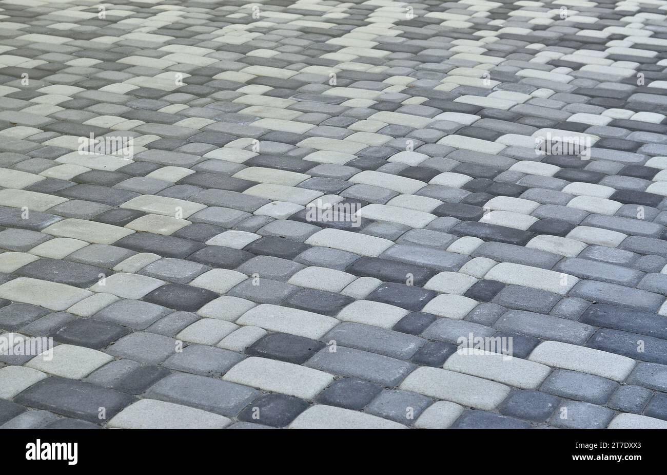 A detailed photo of the square, laid out of modern paving stone with ...