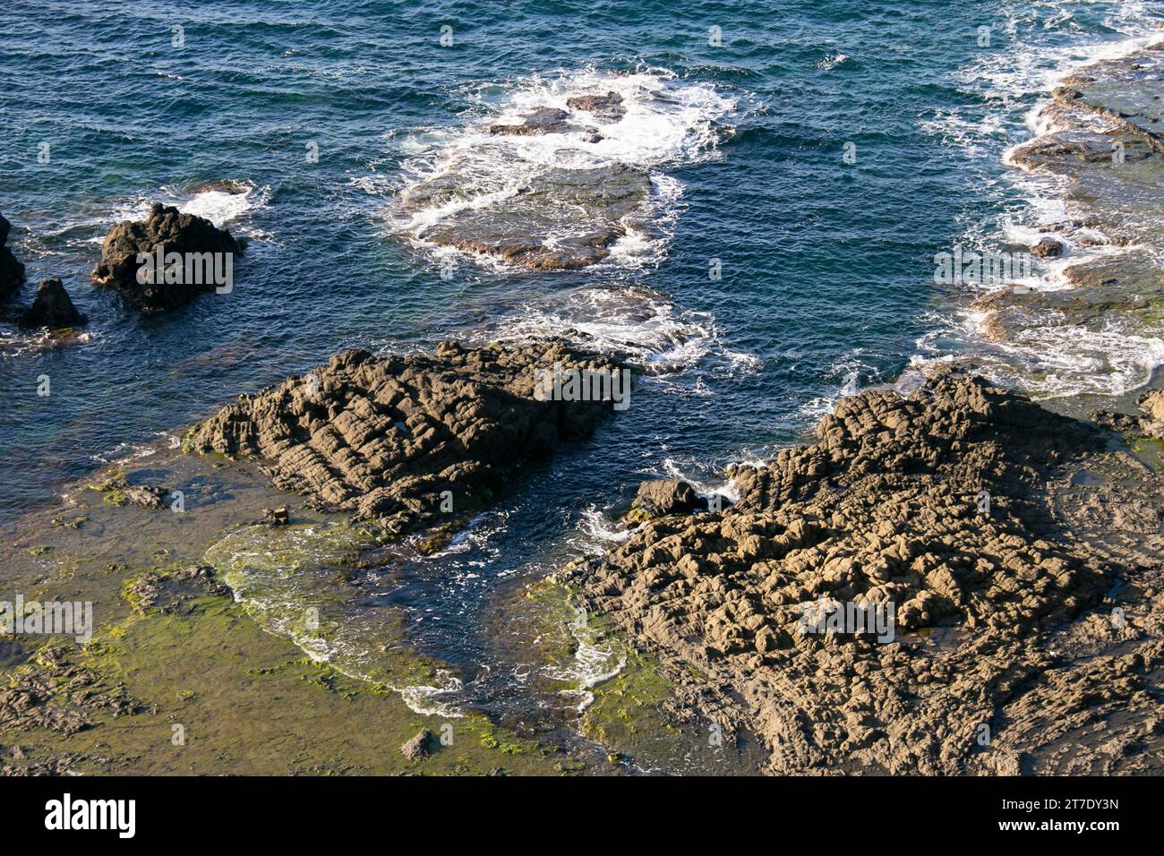 Coastline formed by volcanic activity in Ogi coast in Sado Island ...