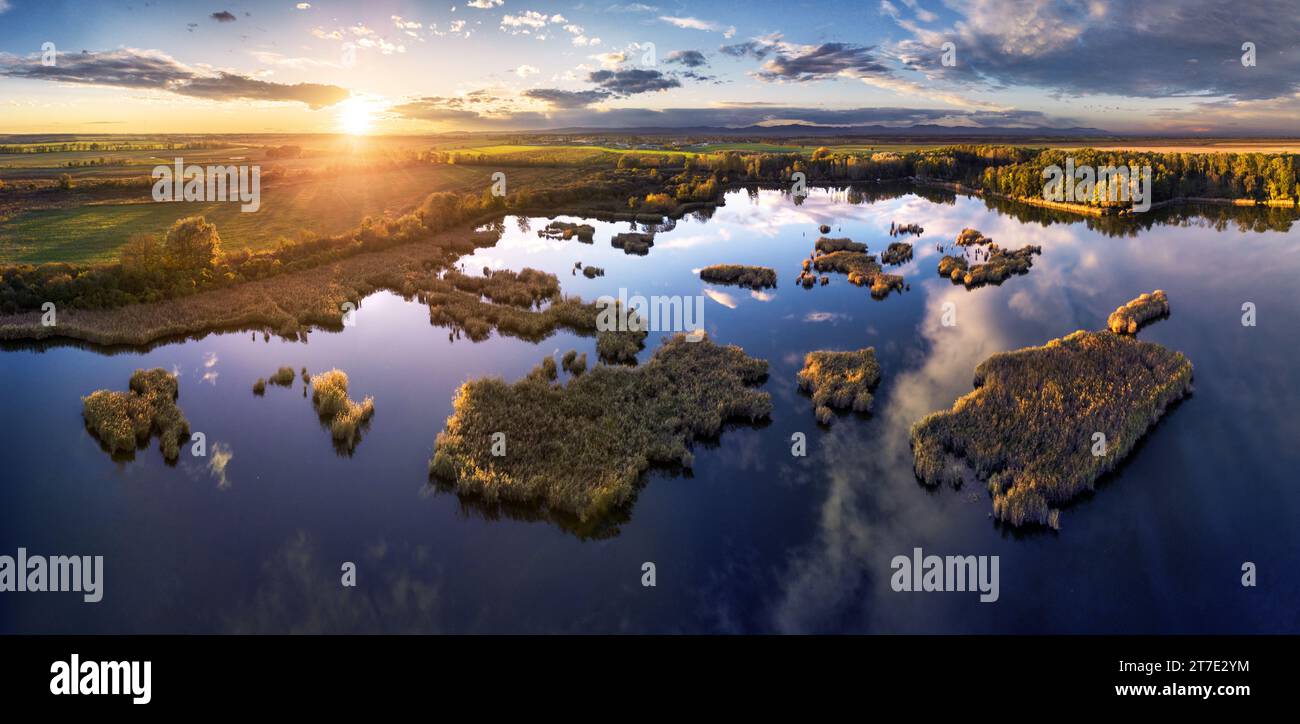 A drone photo of lake - pond bog with sun - Absolutely stunning aerial ...