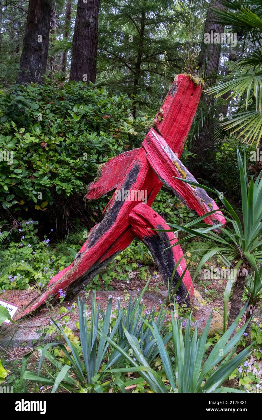 Red man Running Sculpture, Tofino Botanical Gardens Stock Photo - Alamy